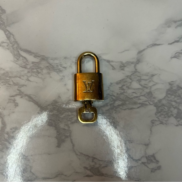 Louis Vuitton | Accessories | Authentic Louis Vuitton Lock Key 31 ...